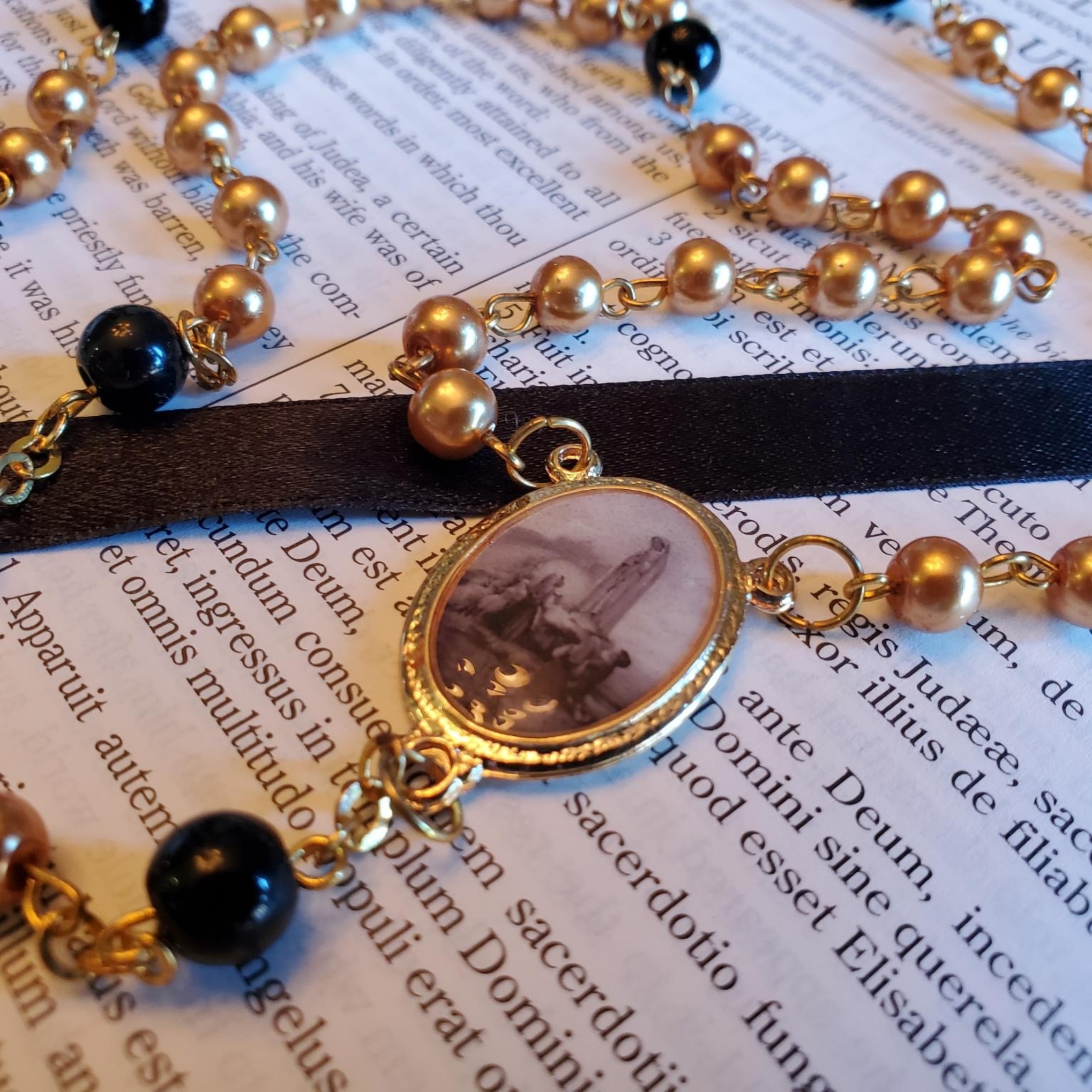 Our Lady of Fatima Gold and Black Rosary - The Founders Tradin Post